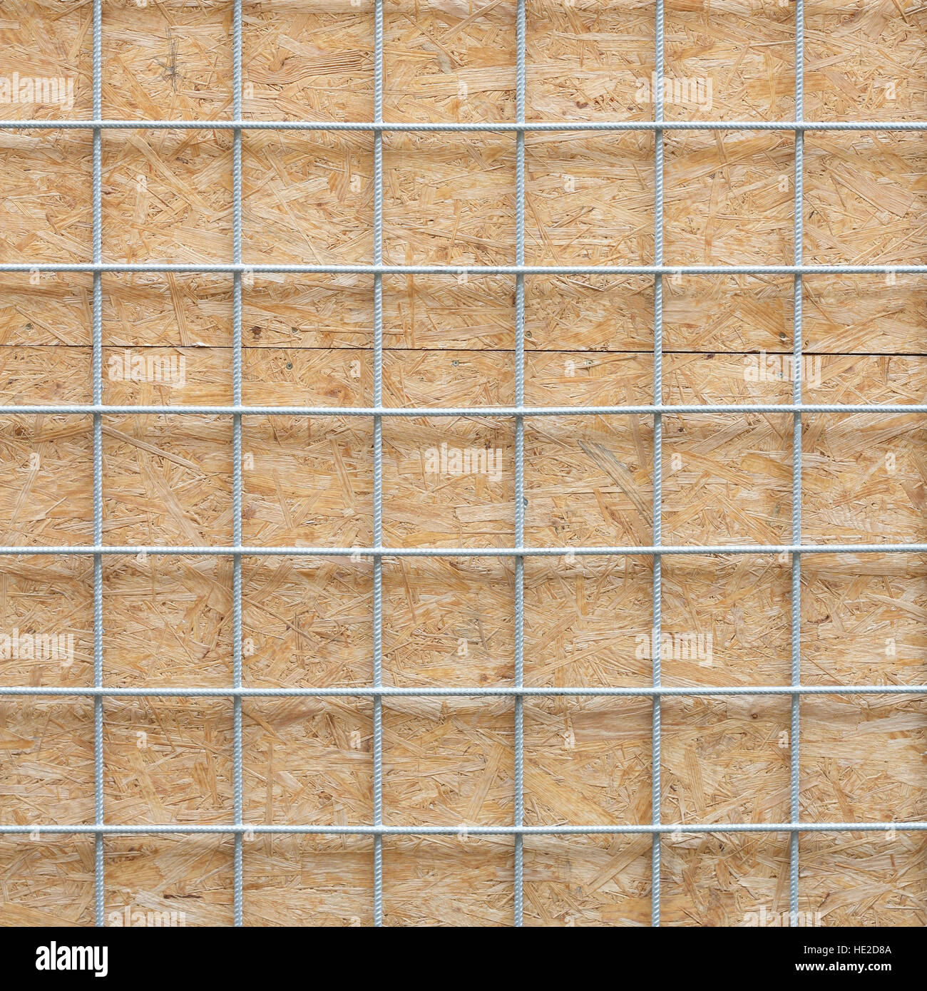 Metal grid and wooden board texture Stock Photo - Alamy