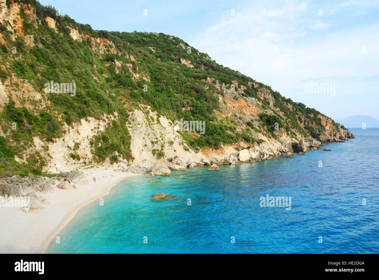 Beautiful remote beach with crystal clear water Stock Photo - Alamy