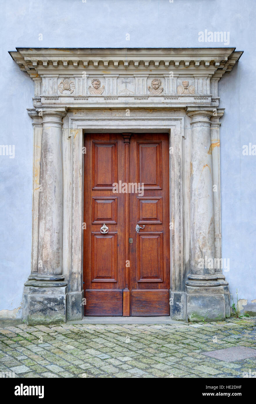 Old monastery portal and brown wooden door Stock Photo - Alamy