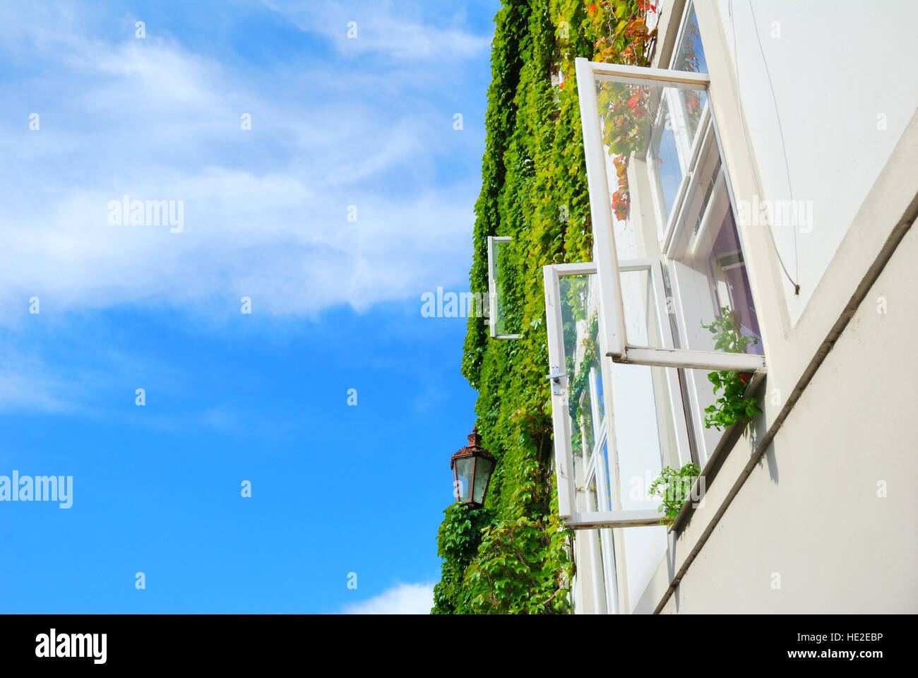 White open window with street lamp and blue sky Stock Photo - Alamy
