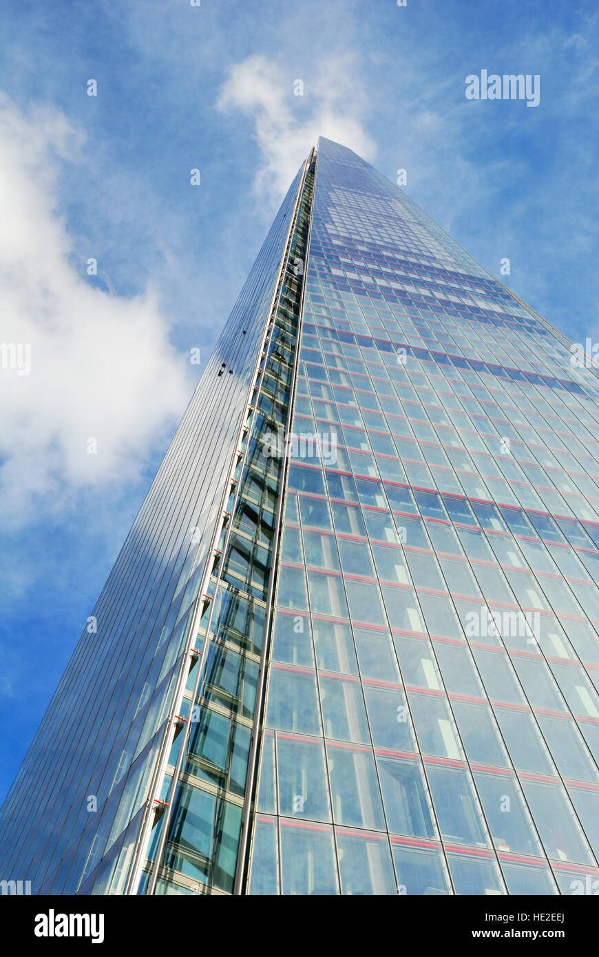 Tall office skyscraper building with clouds Stock Photo - Alamy