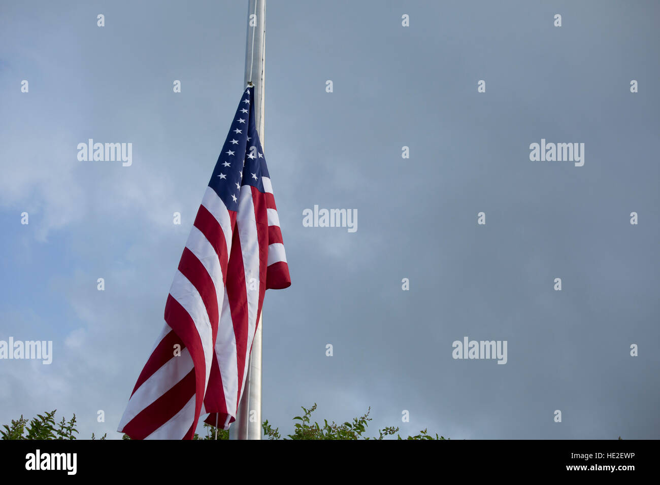 American flag at half mast for mourning and holidays Stock Photo - Alamy