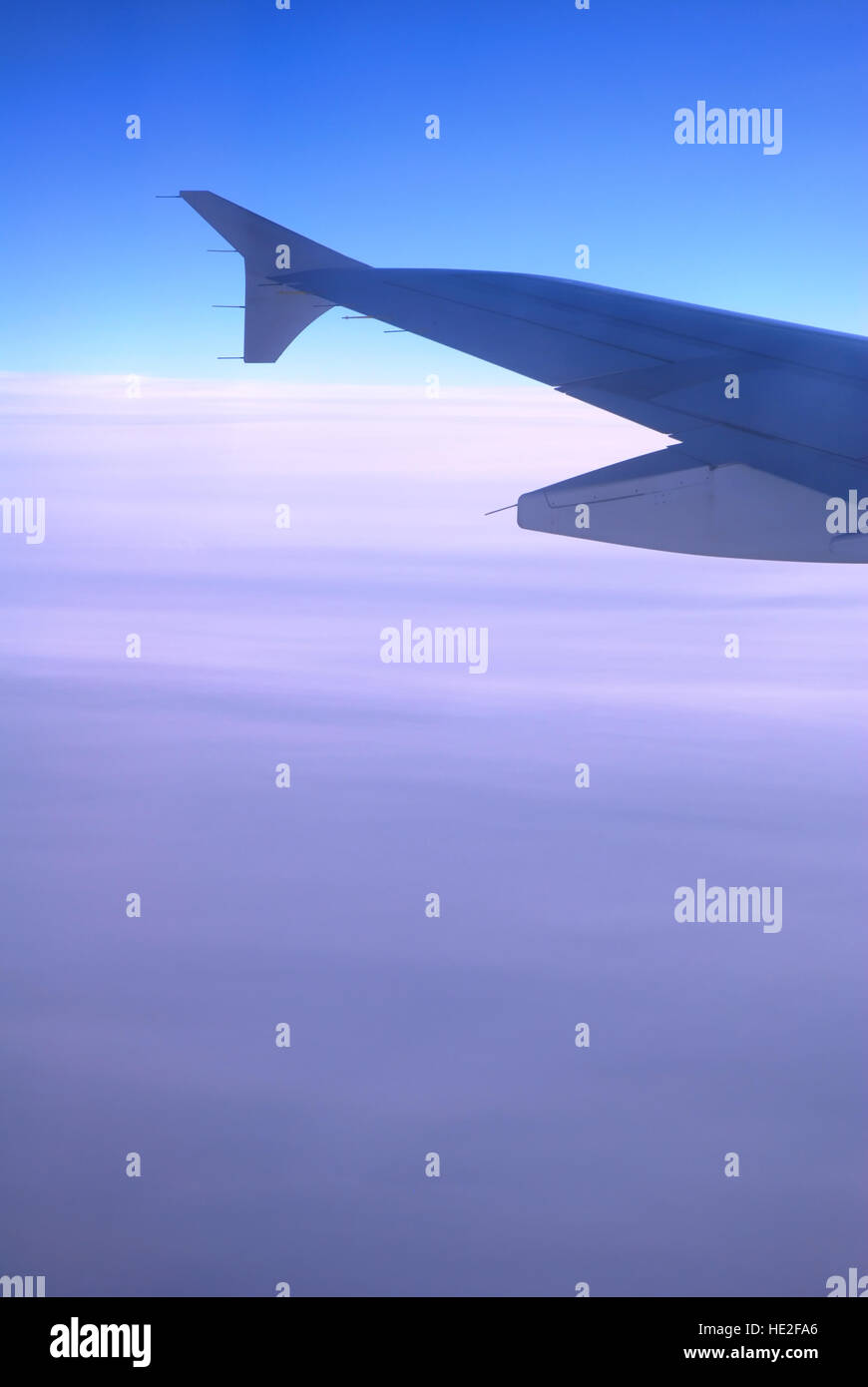 Airplane Wing Above Clouds Stock Photo - Alamy Airplane Wing Above Clouds Stock Photo - Alamy