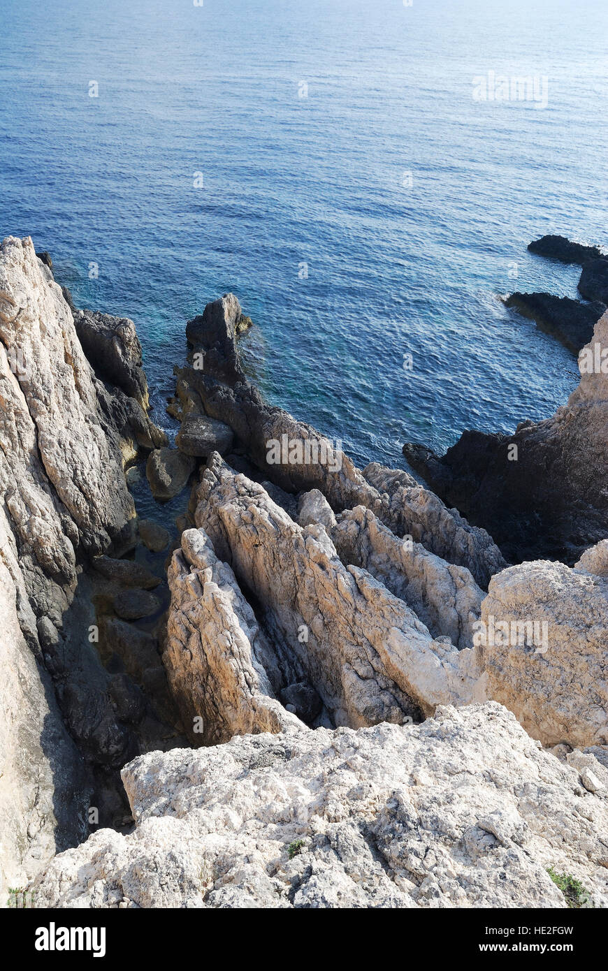 Sharp Rocks and Sea Stock Photo - Alamy