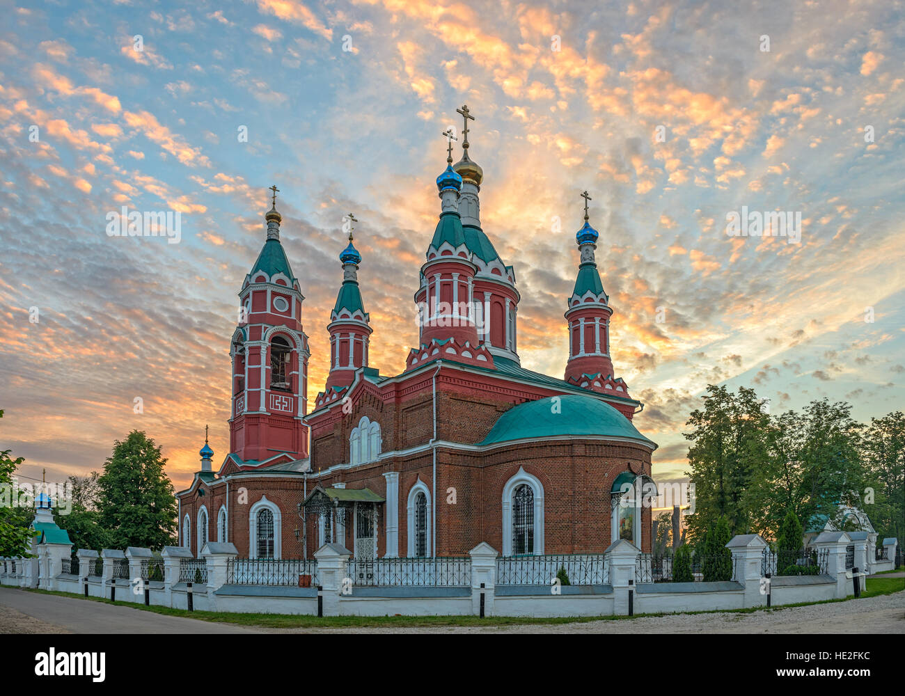 Russian orthodox church over burning sunset Stock Photo - Alamy