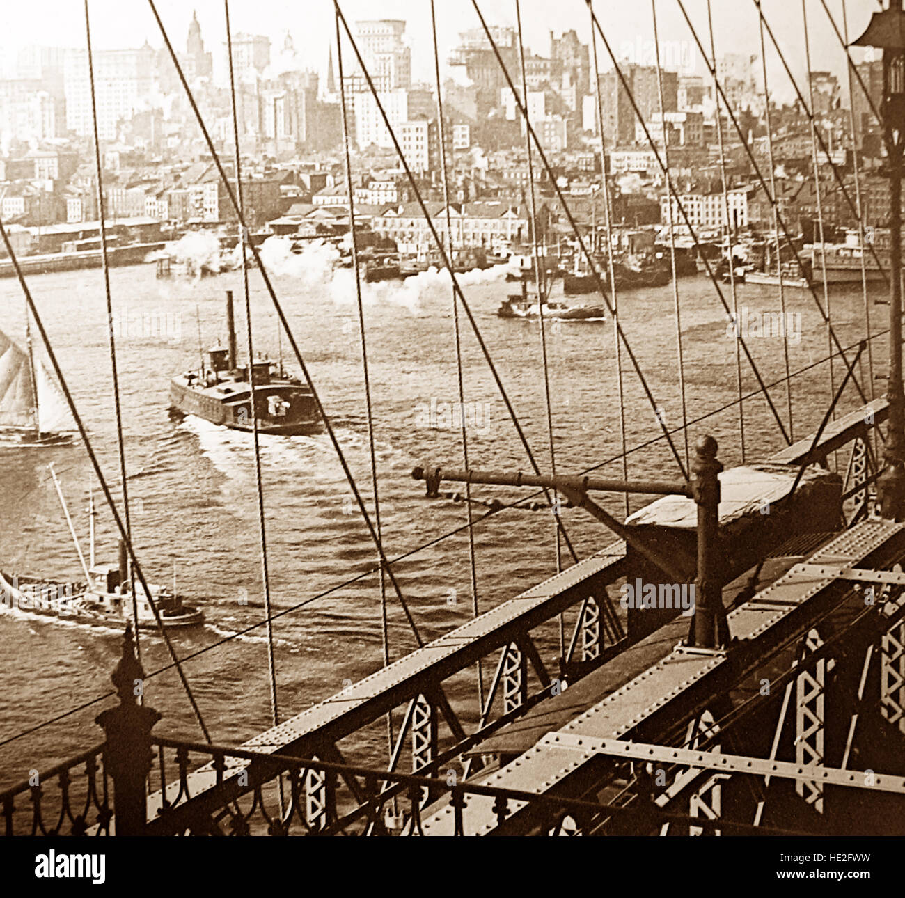 New York skyscrapers from the Brooklyn Bridge - early 1900s Stock Photo ...