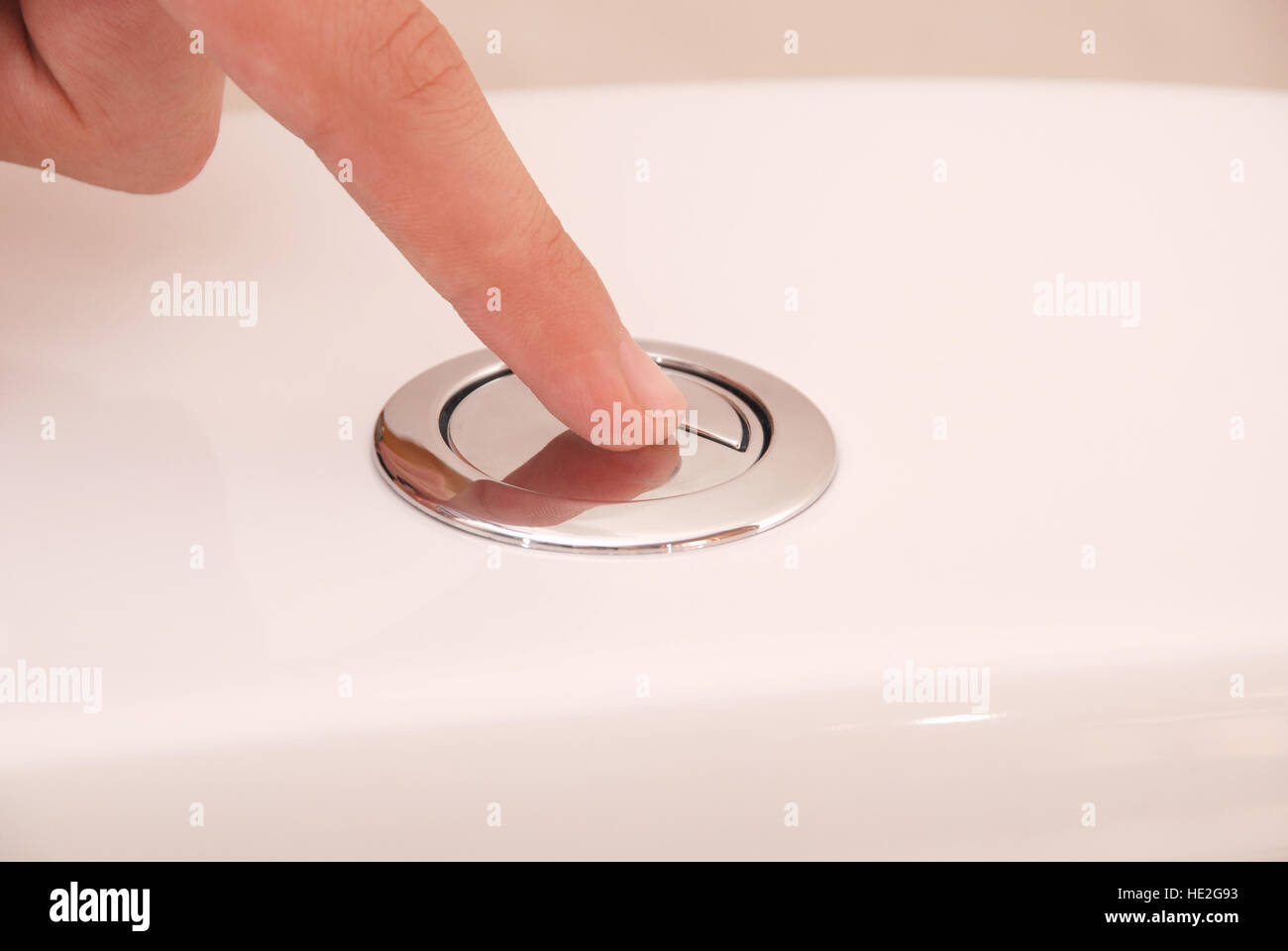 Flushing the toilet hi-res stock photography and images - Alamy