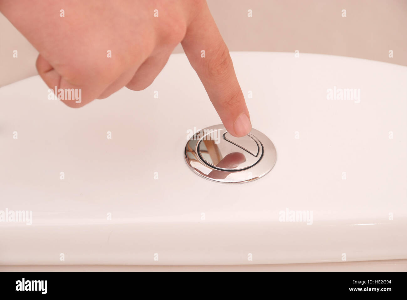 Hand flushing toilet hi-res stock photography and images - Alamy