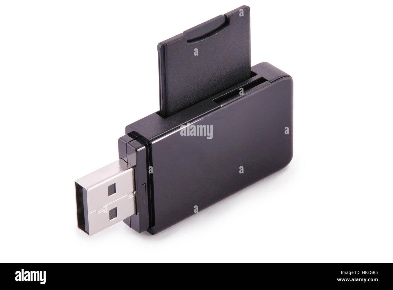 Black card reader with memory card on white. Clipping path included ...