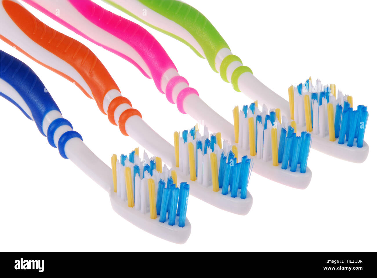 Colored toothbrushes. Isolated on white background. Clipping path ...