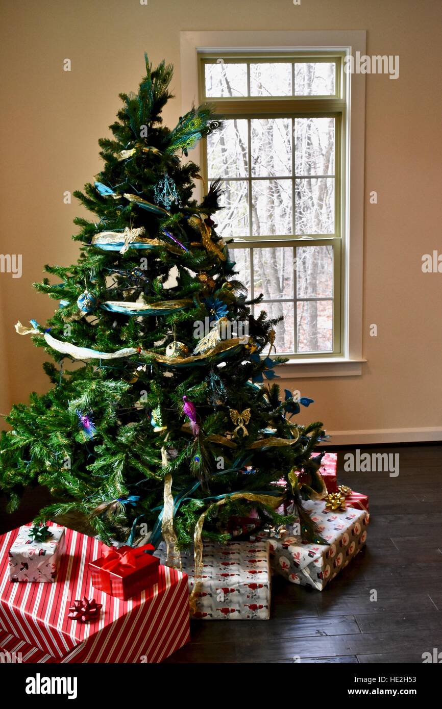Christmas presents under the Christmas tree Stock Photo - Alamy