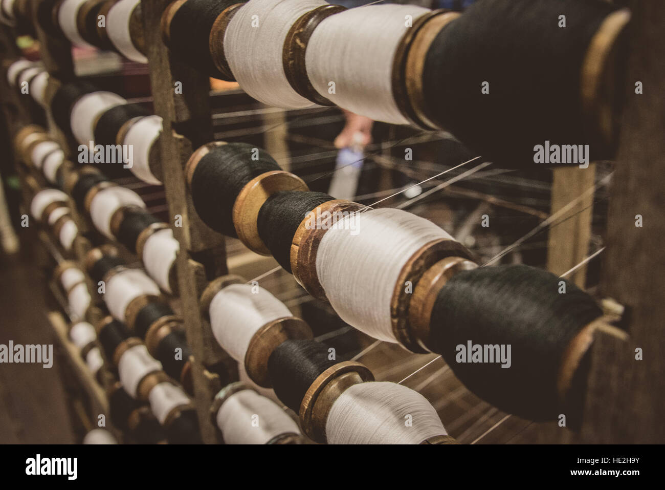 Old wooden bobbins hi-res stock photography and images - Alamy