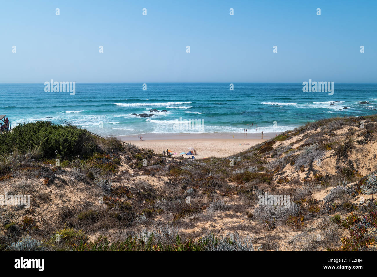 A view of the atlantic ocean from a beach showing cliffs and rocks ...