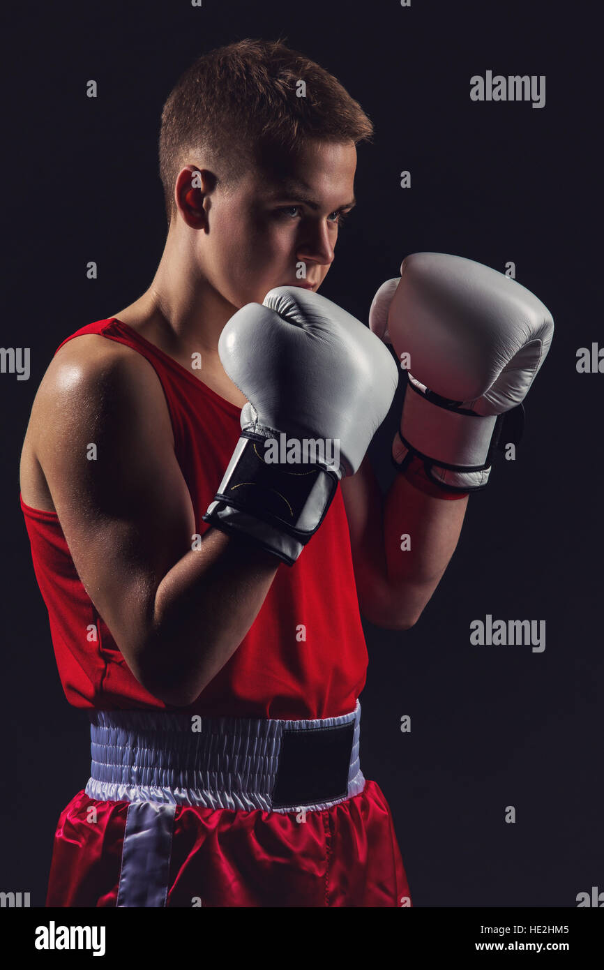 Young boxer sportsman in red sport suit Stock Photo - Alamy
