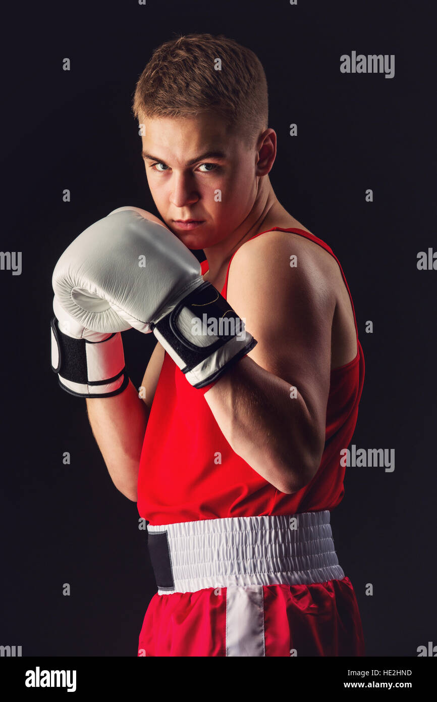 Young boxer sportsman in red sport suit Stock Photo - Alamy