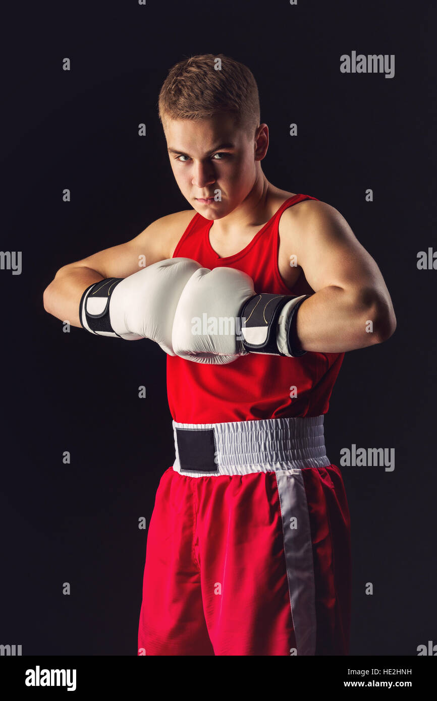 Young boxer sportsman in red sport suit Stock Photo - Alamy