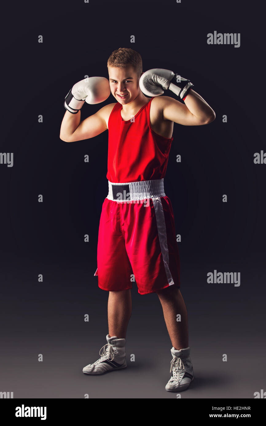 Young boxer sportsman in red sport suit Stock Photo - Alamy