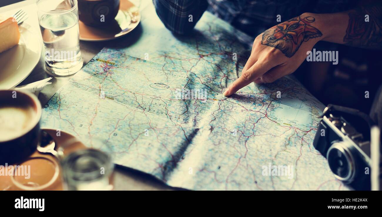 Person Choosing Destination On Map Concept Stock Photo - Alamy