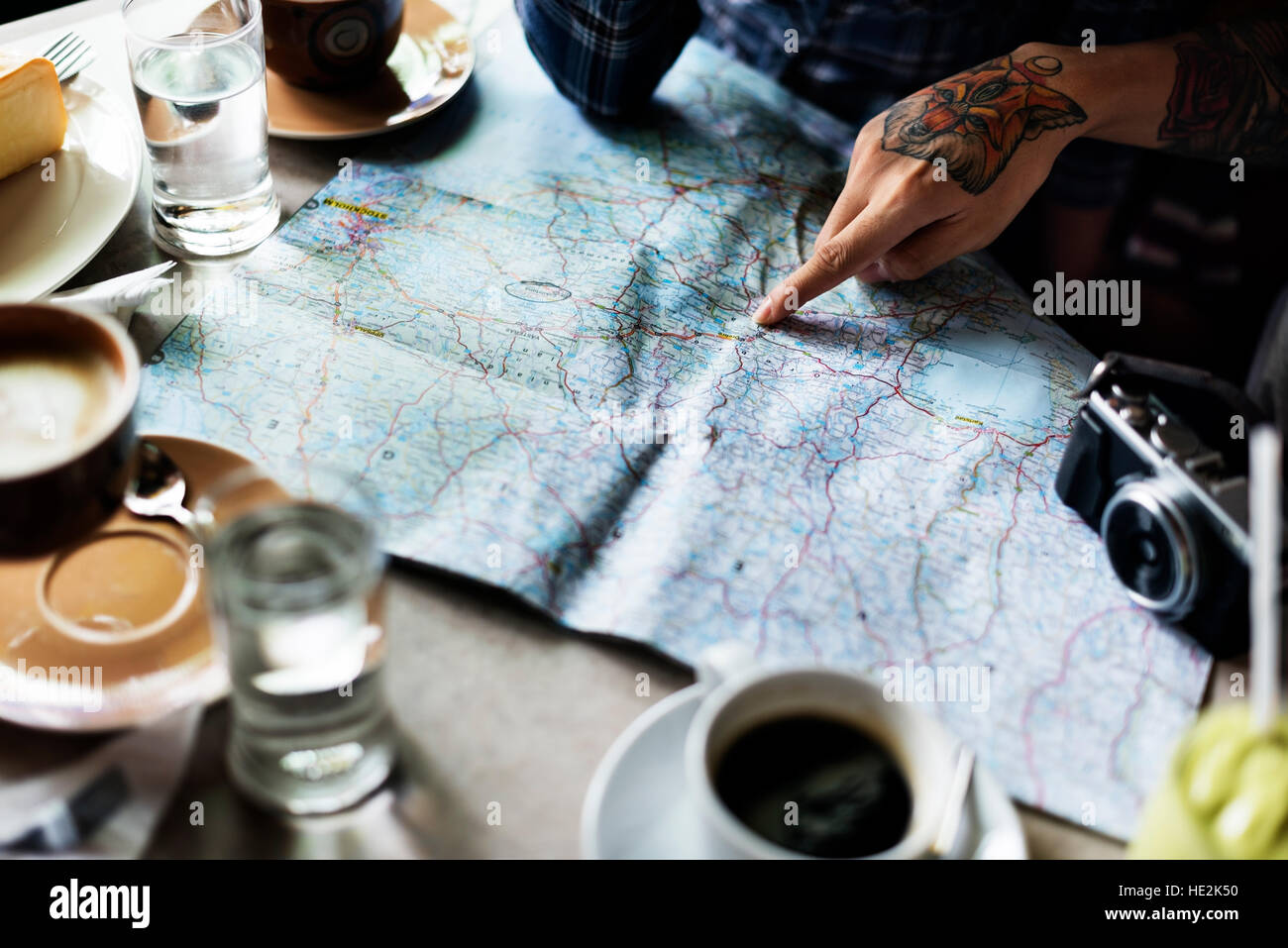 Person Choosing Destination On Map Concept Stock Photo - Alamy