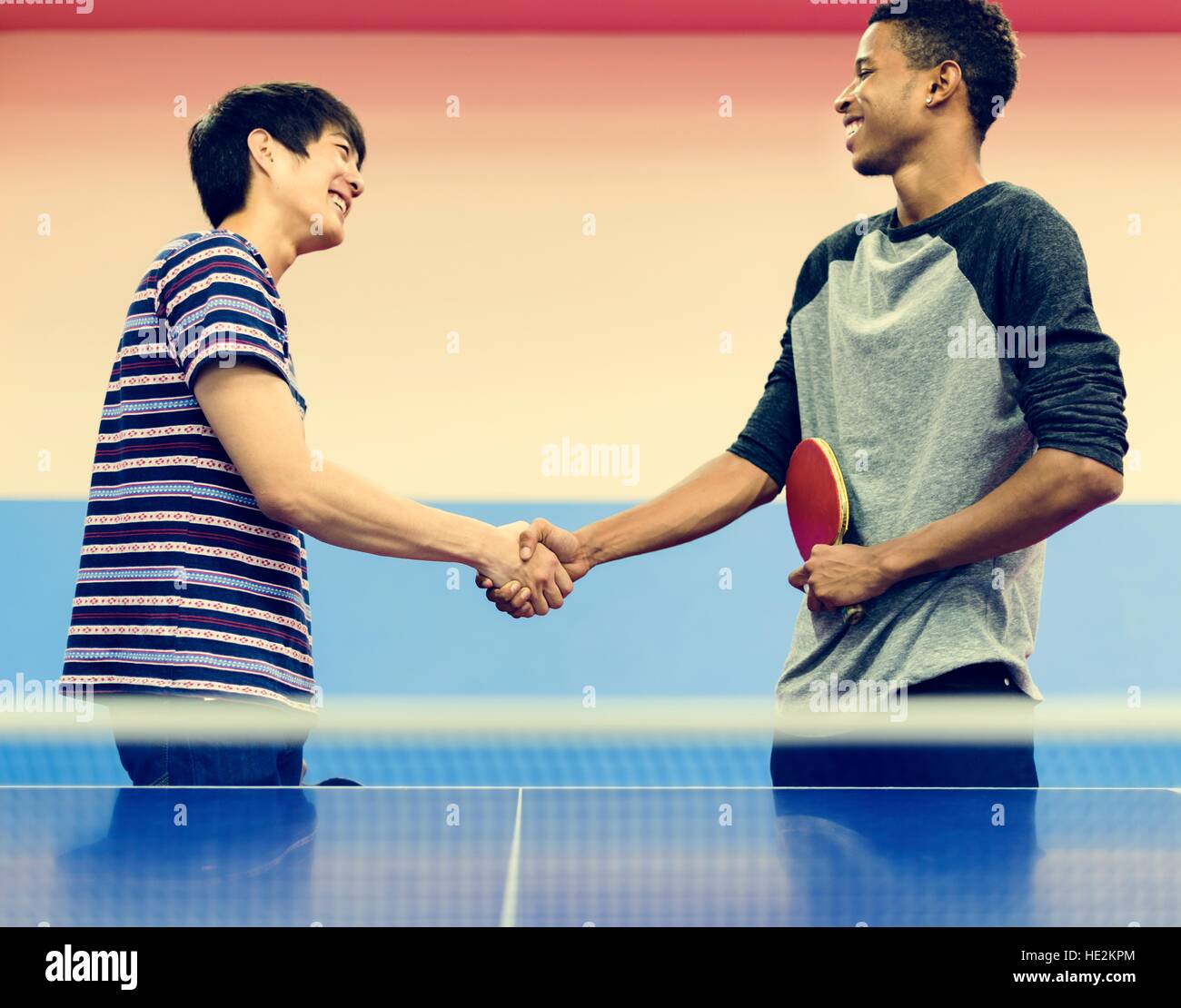 Diverse friends playing tennis hi-res stock photography and images - Alamy