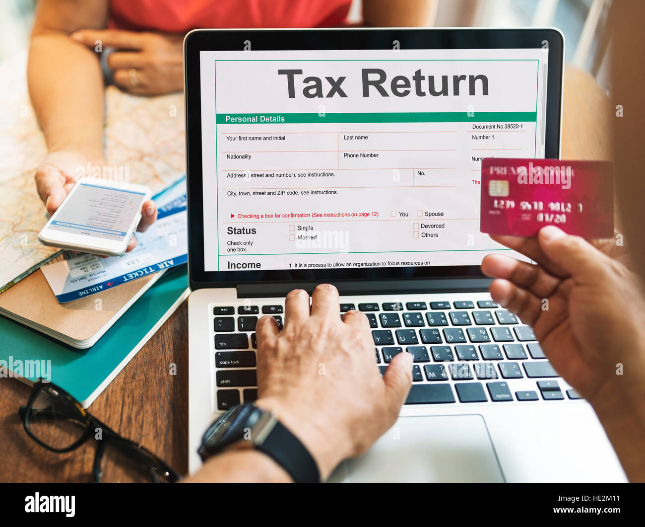 Income Tax Return Deduction Refund Concept Stock Photo - Alamy