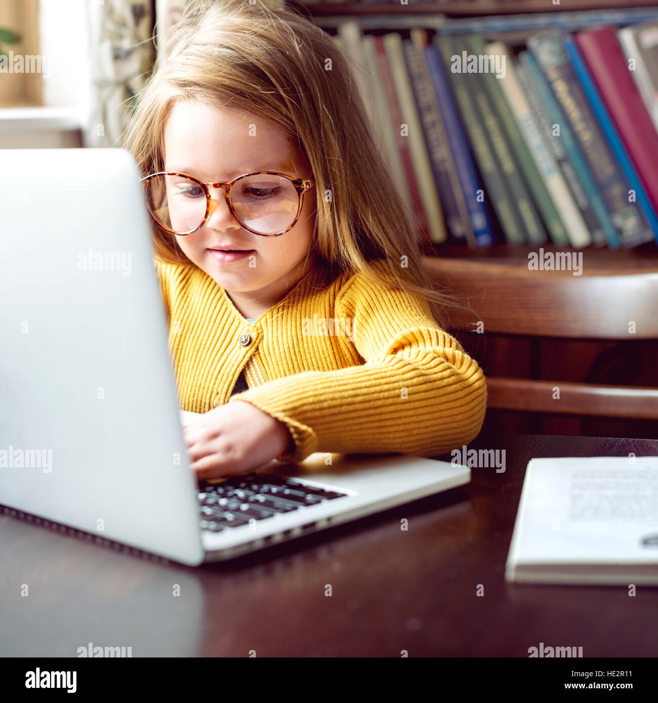 Little Girl Using Digital Laptop E-learning Concept Stock Photo - Alamy