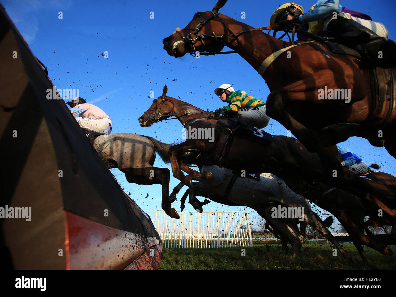 Horses jump the first fence during the Betfred 'Watch Sky Sports In Our ...