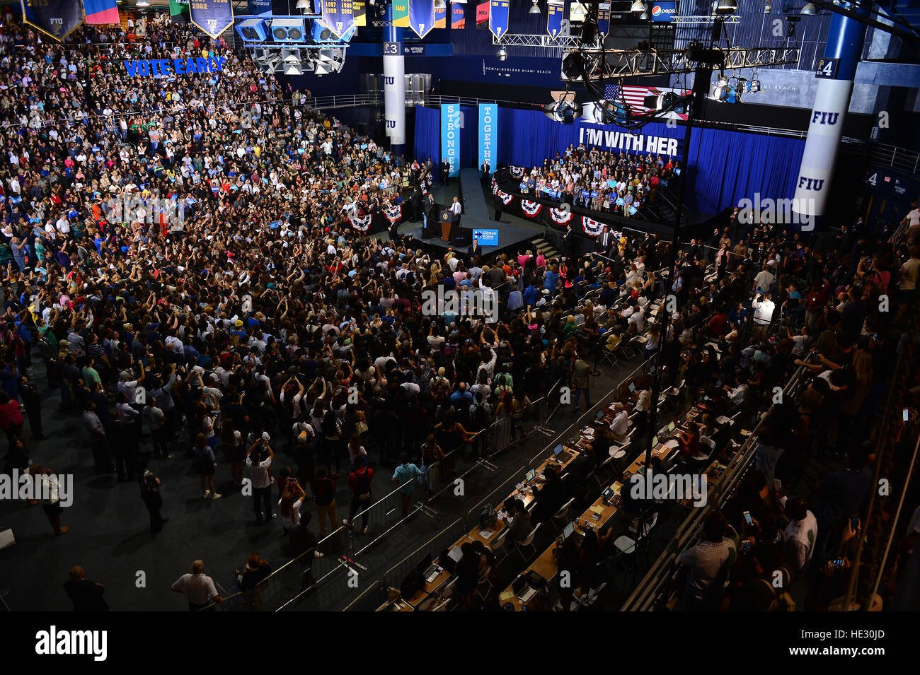 U.S. President Barack Obama speaks during a campaign rally to a crowd ...