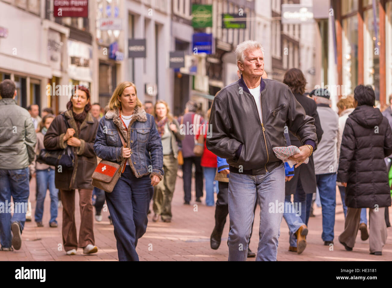 AMSTERDAM, NETHERLANDS - People stroll on Kalverstraat, in downtown ...