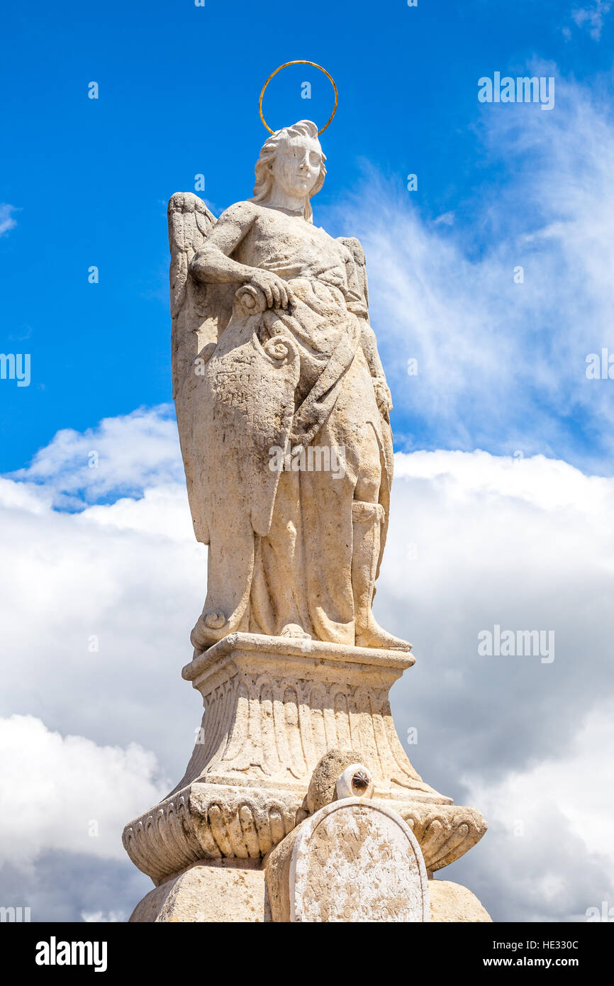 Statue of saint raphael roman bridge cordoba hi-res stock photography ...