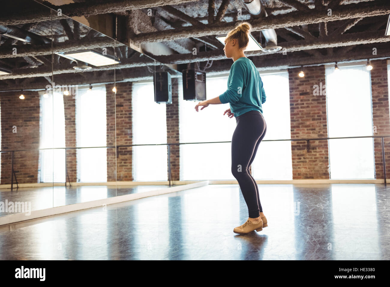 Woman practicing a dance in dance studio Stock Photo - Alamy