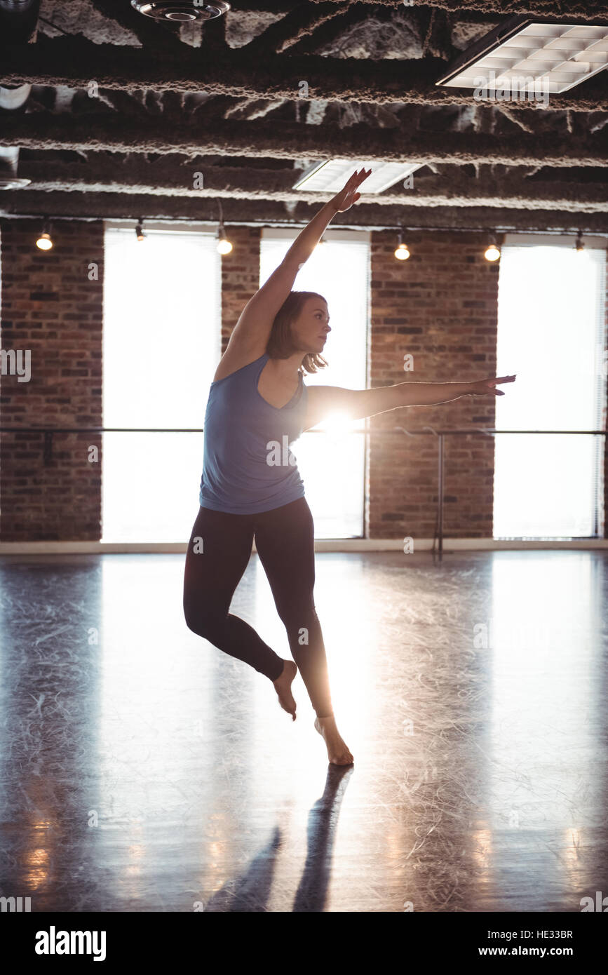 Woman practicing dance in dance studio Stock Photo - Alamy