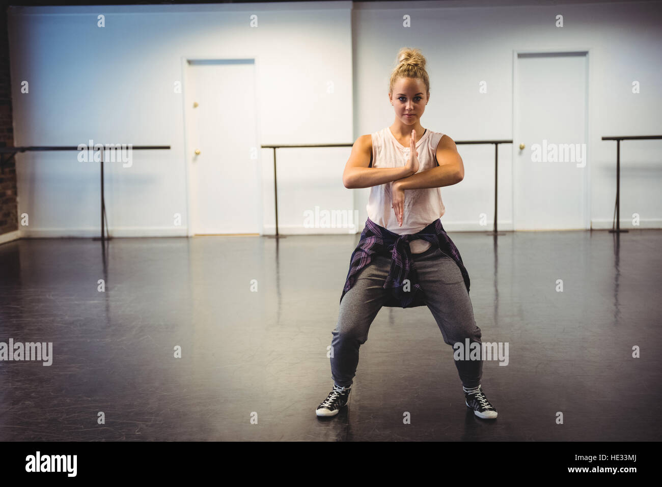 Woman practicing a dance moves in dance studio Stock Photo - Alamy