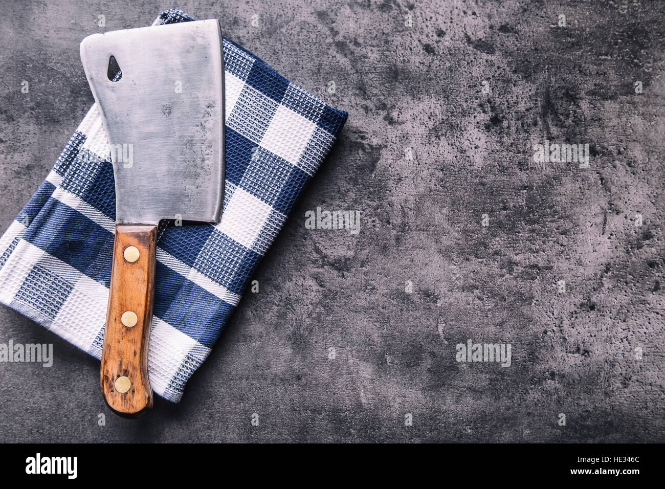 Butcher. Vintage butcher meat cleavers with cloth towel on dark ...