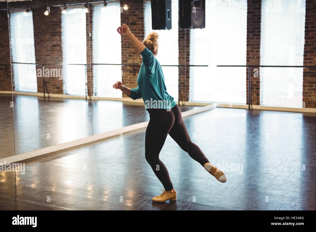 Woman practicing a dance in dance studio Stock Photo - Alamy