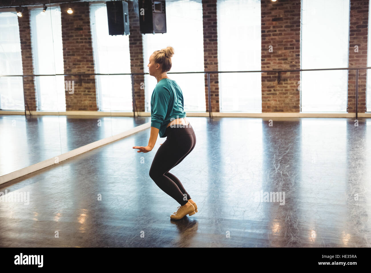Woman practicing a dance in dance studio Stock Photo - Alamy