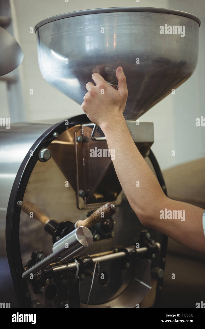 Professional roaster using coffee hi-res stock photography and images ...