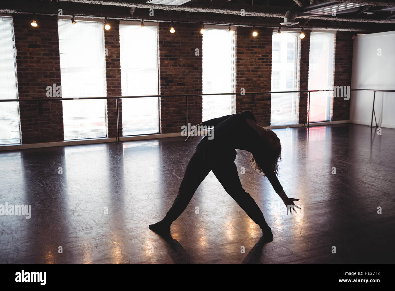 Woman practicing dance in dance studio Stock Photo - Alamy