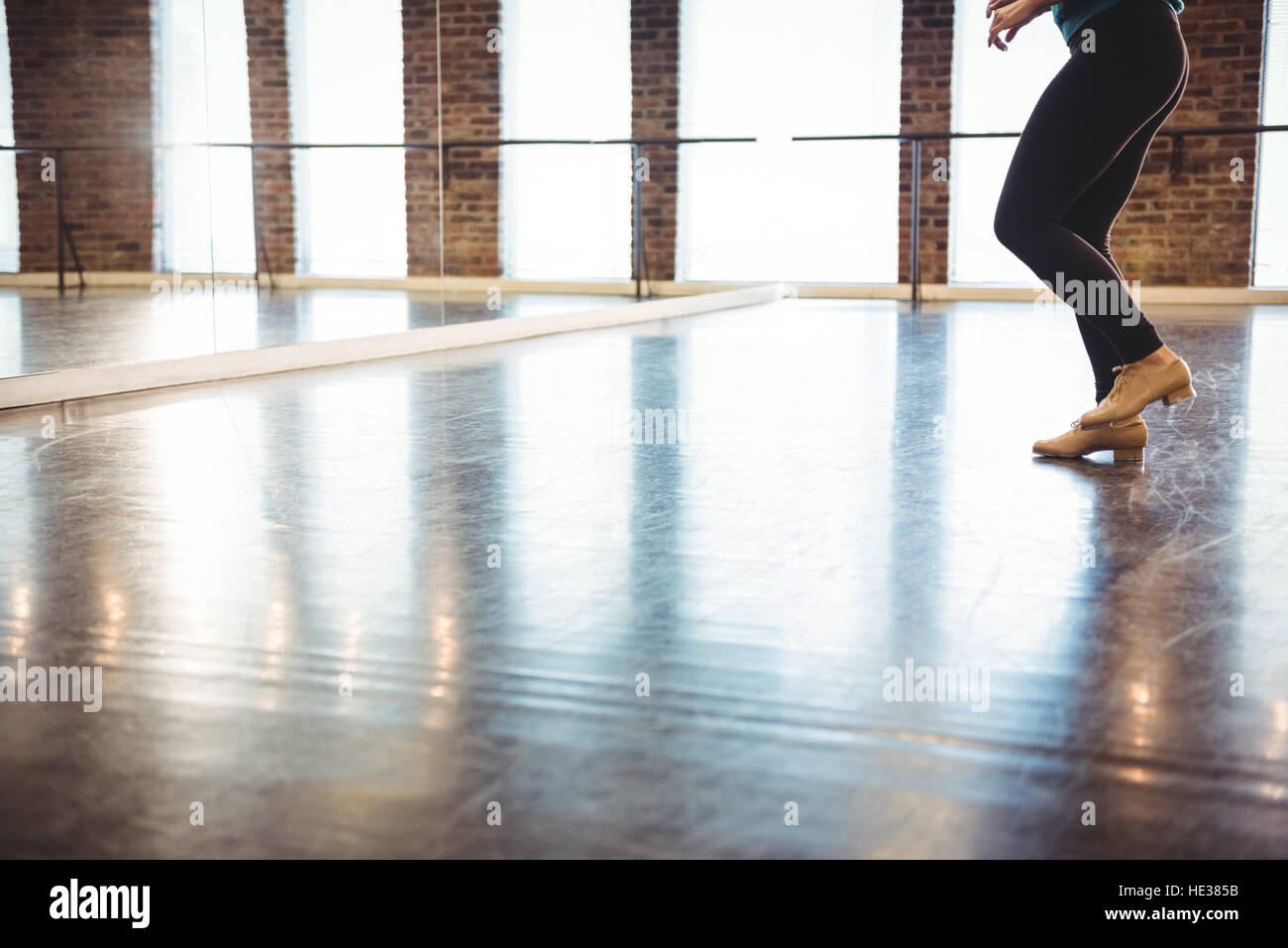 Woman practicing a dance in dance studio Stock Photo - Alamy