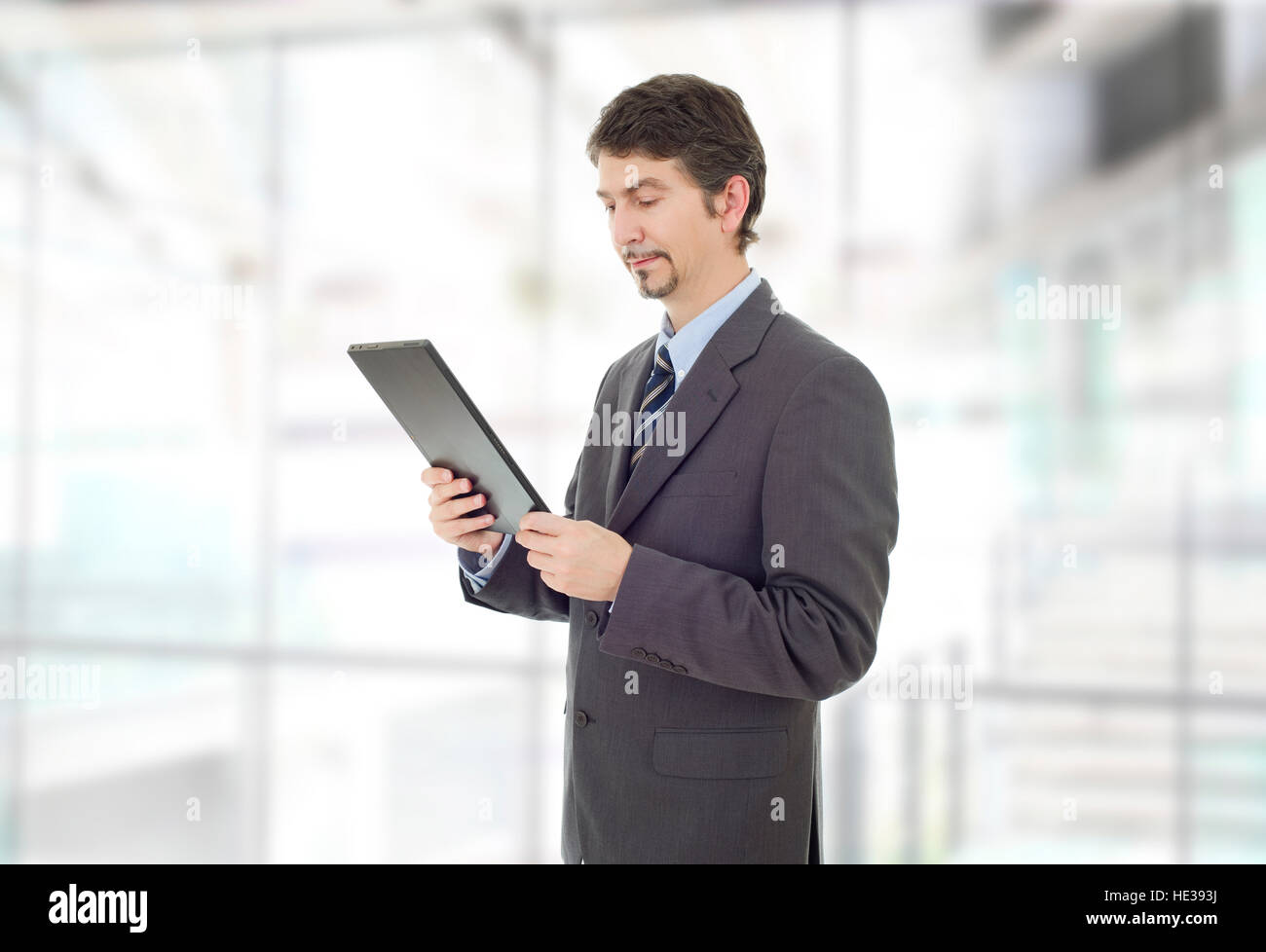 businessman using touch pad of tablet pc, at the office Stock Photo - Alamy