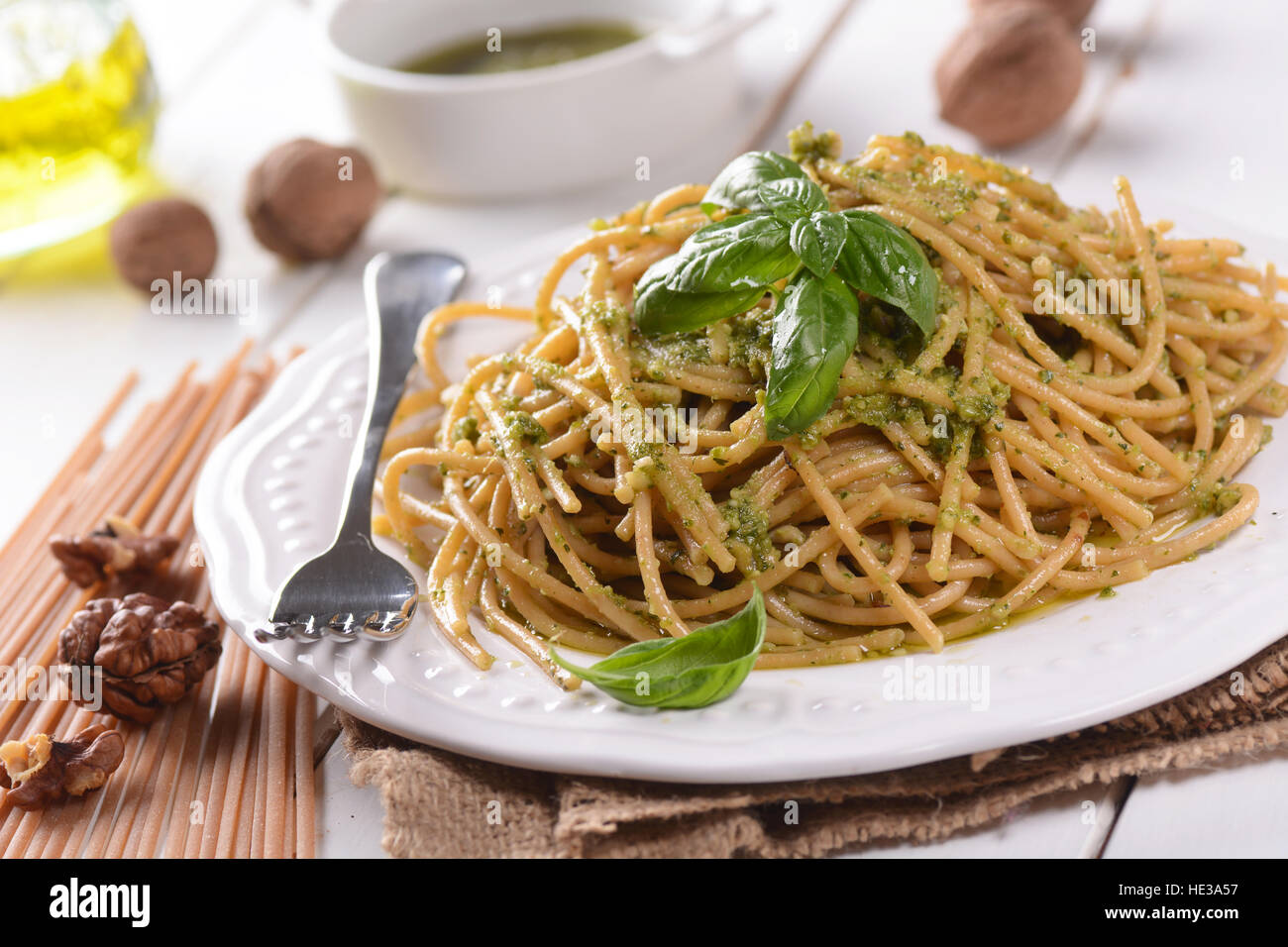 spaghetti with walnut pesto - traditional Italian recipe Stock Photo ...