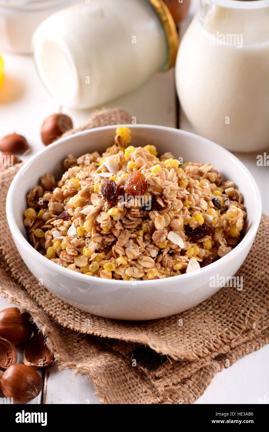 muesli dried fruit in white bowl for breakfast Stock Photo - Alamy