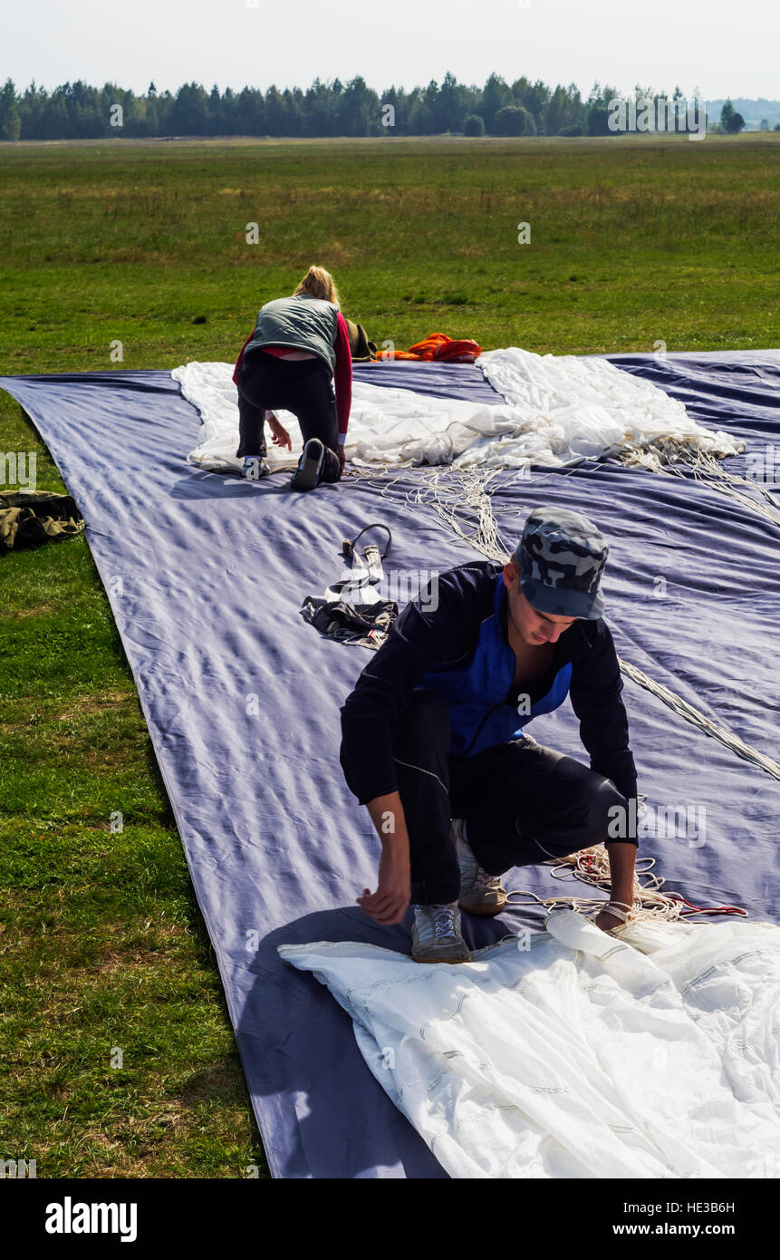 Parachutists - 2014.Packing of parachute Stock Photo - Alamy