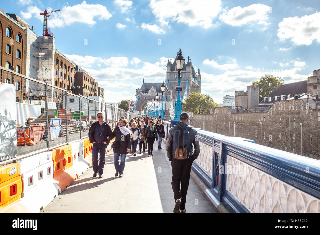 London UK, people crossing Tower bridge in repairing Stock Photo - Alamy