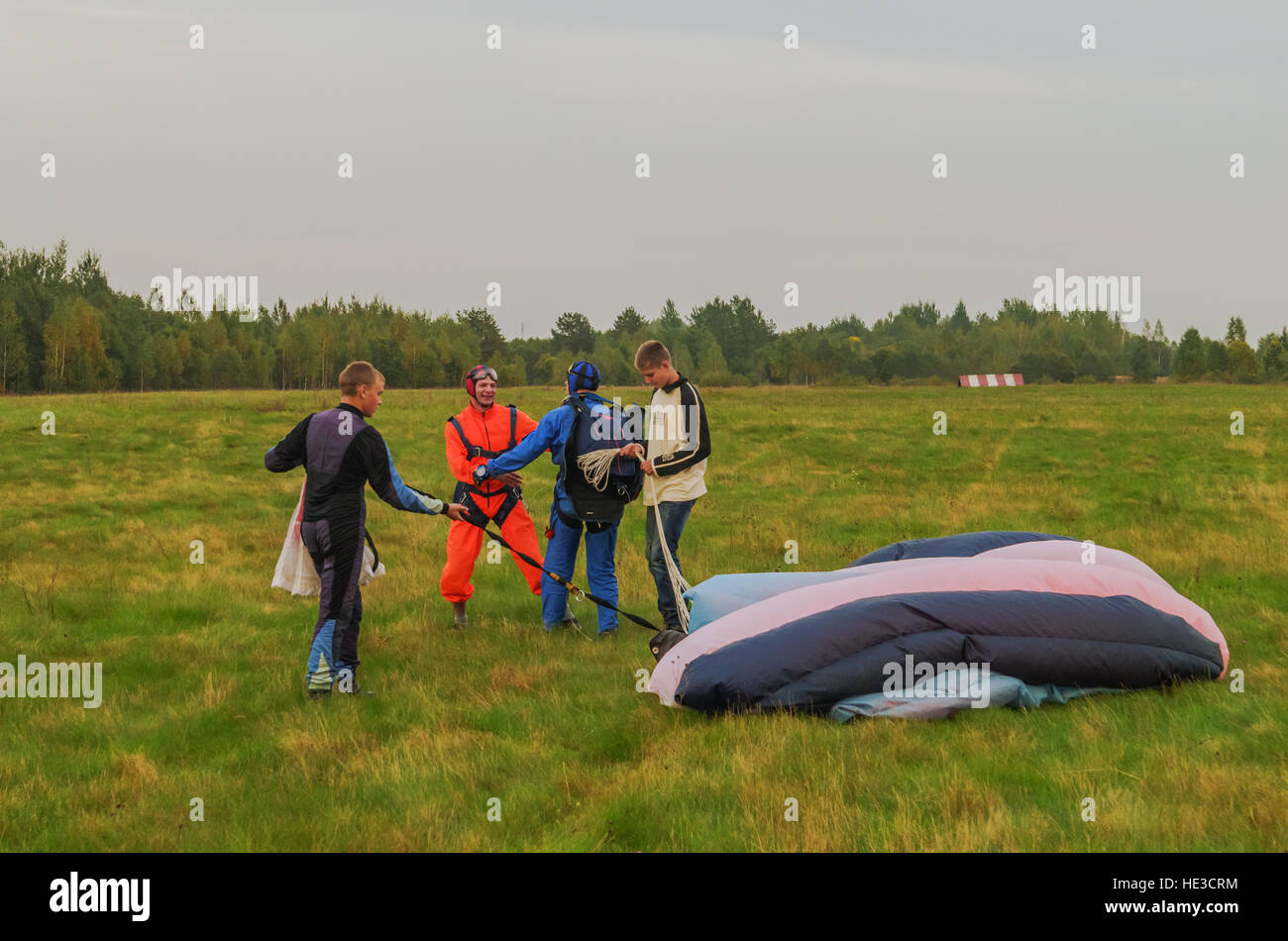 Parachutists - 2014.The skydivers after landing under the parachute ...