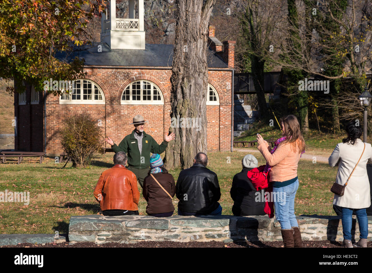 Harpers Ferry, WV - A park ranger talks with visitors at Harpers Ferry ...