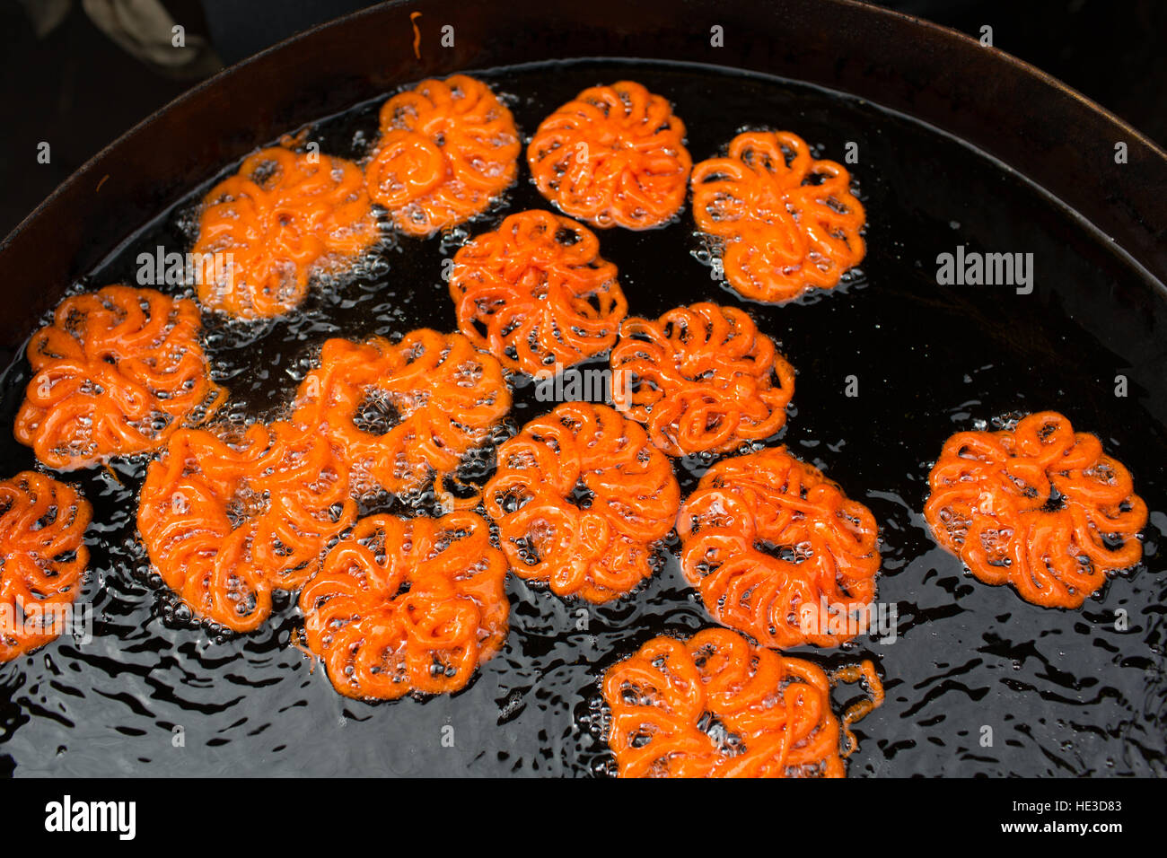 close-up of colorful indian sweets Jalebi cooking Stock Photo - Alamy