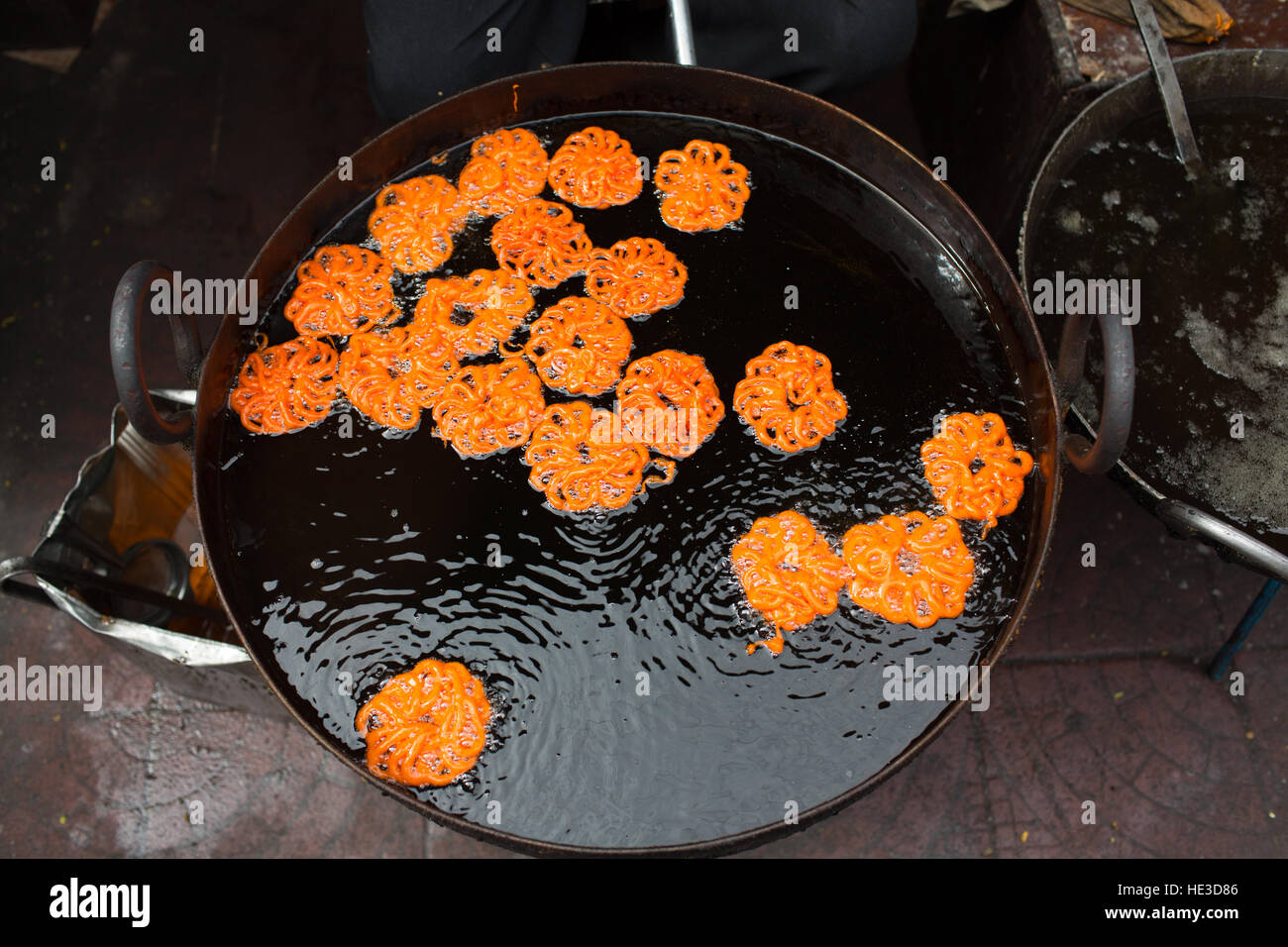 close-up of colorful indian sweets Jalebi cooking Stock Photo - Alamy