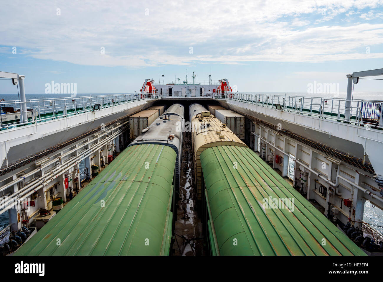 train loaded on the cargo vessel on the sea Stock Photo - Alamy