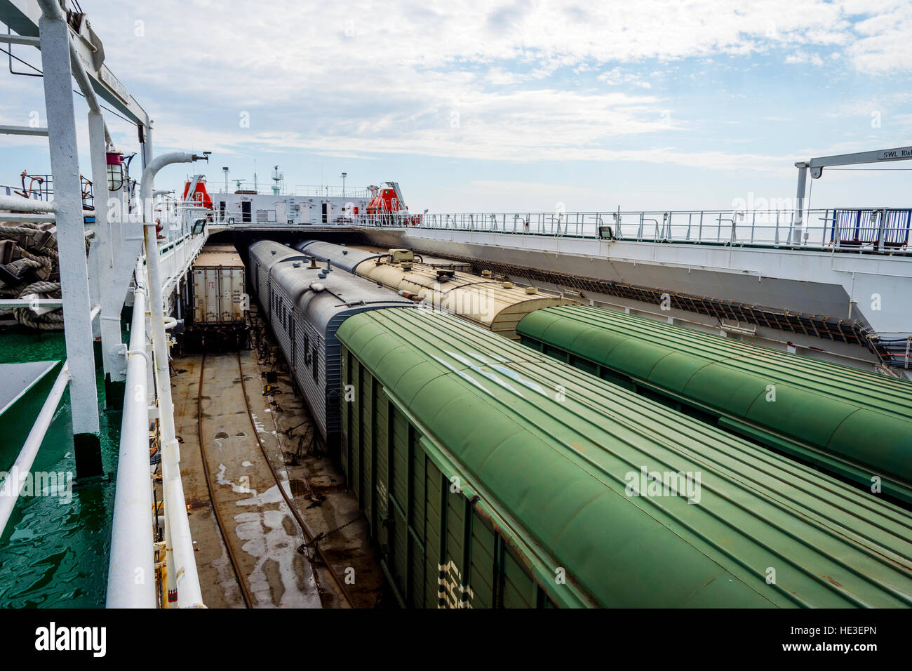 train loaded on the cargo vessel on the sea Stock Photo - Alamy